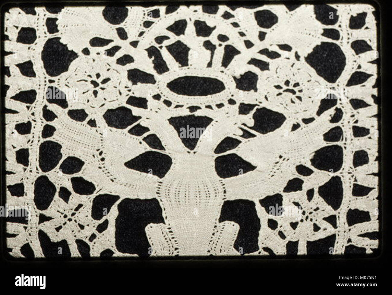 A lace border featuring a double-headed eagle, indicative of imperial ...