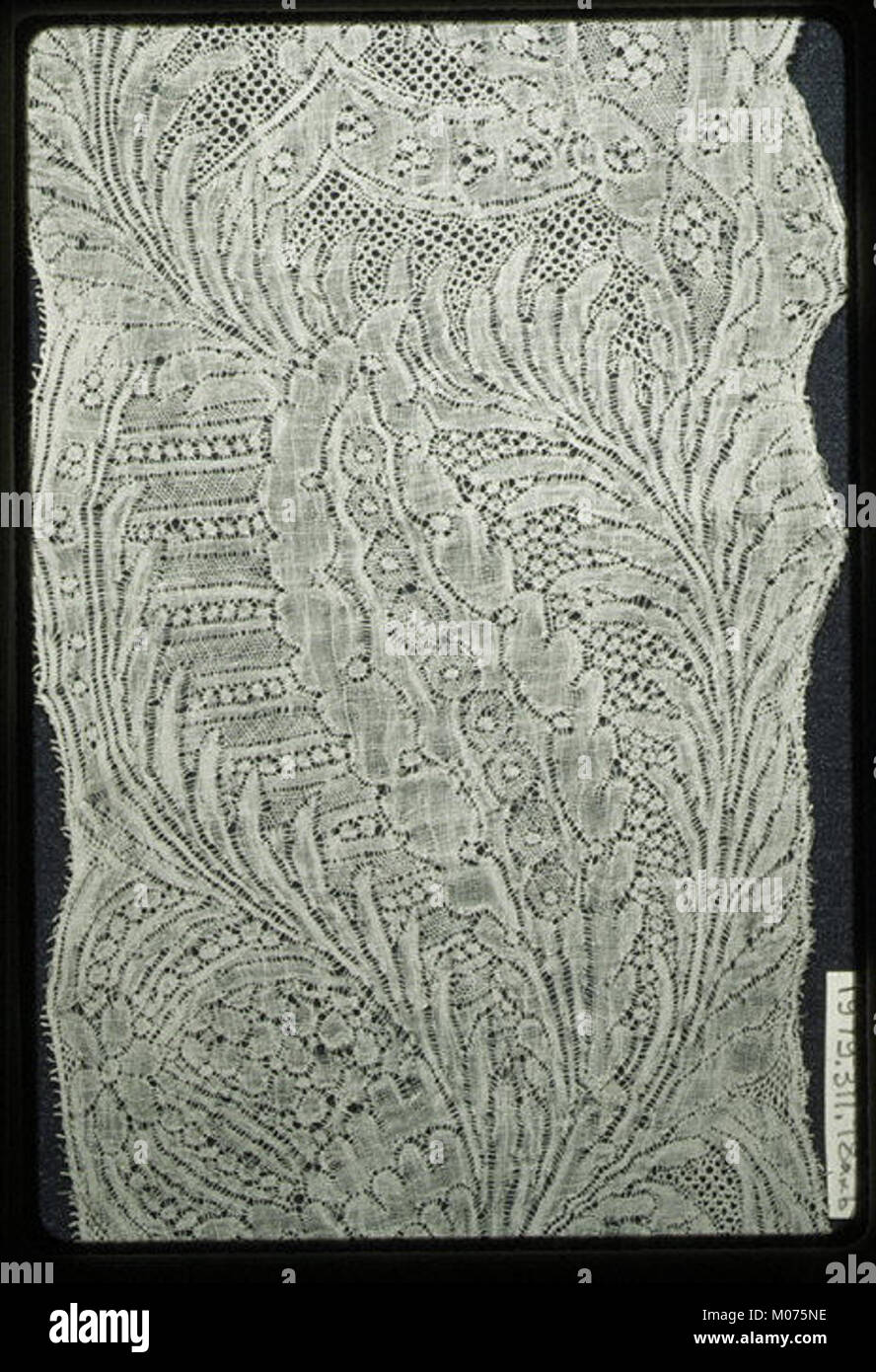 A lappet, cataloged as MET GT52a, is a decorative garment or headdress ...