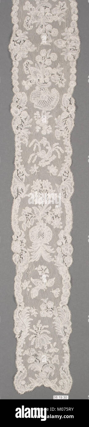 This lappet, likely part of a historical garment, reflects the textile ...