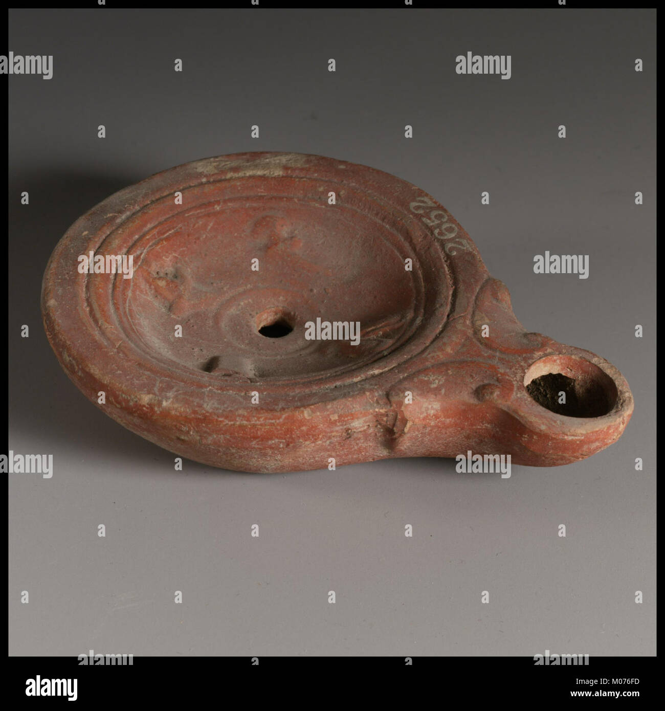 This lamp is a historical example of lighting design, reflecting the ...