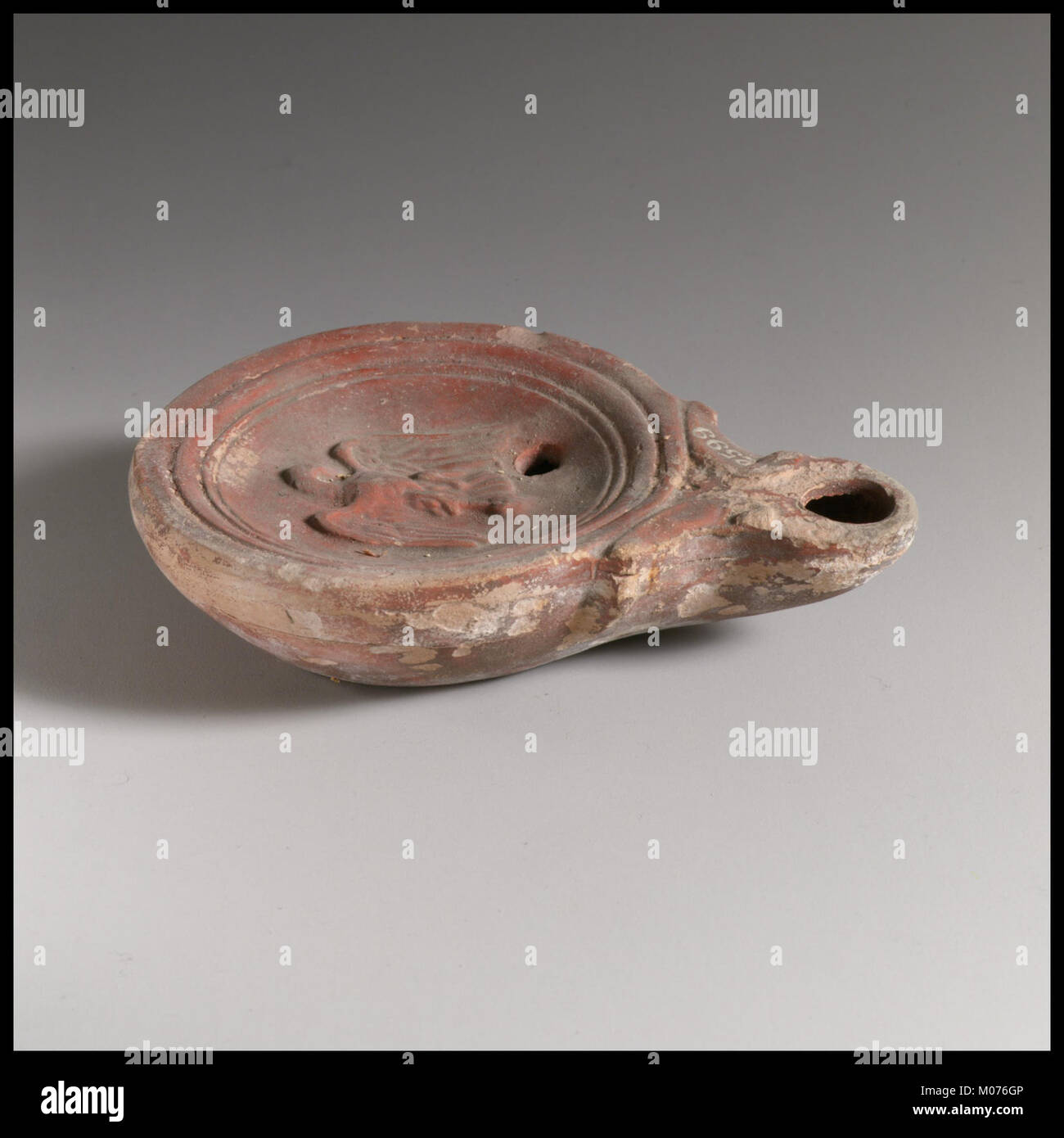 This lamp, part of the museumâ€™s collection, represents the functional ...