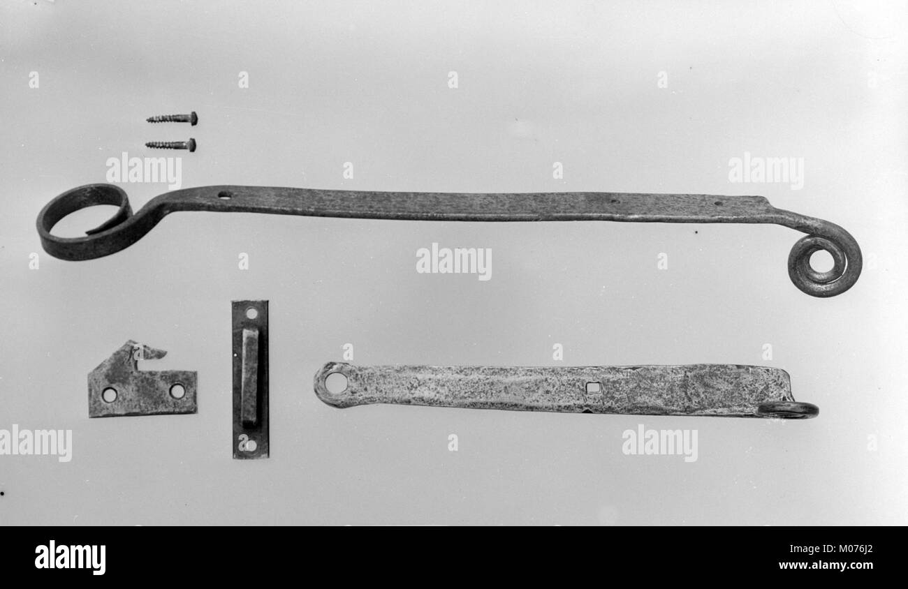 This latch, bar, and catch mechanism was used to secure doors or gates ...