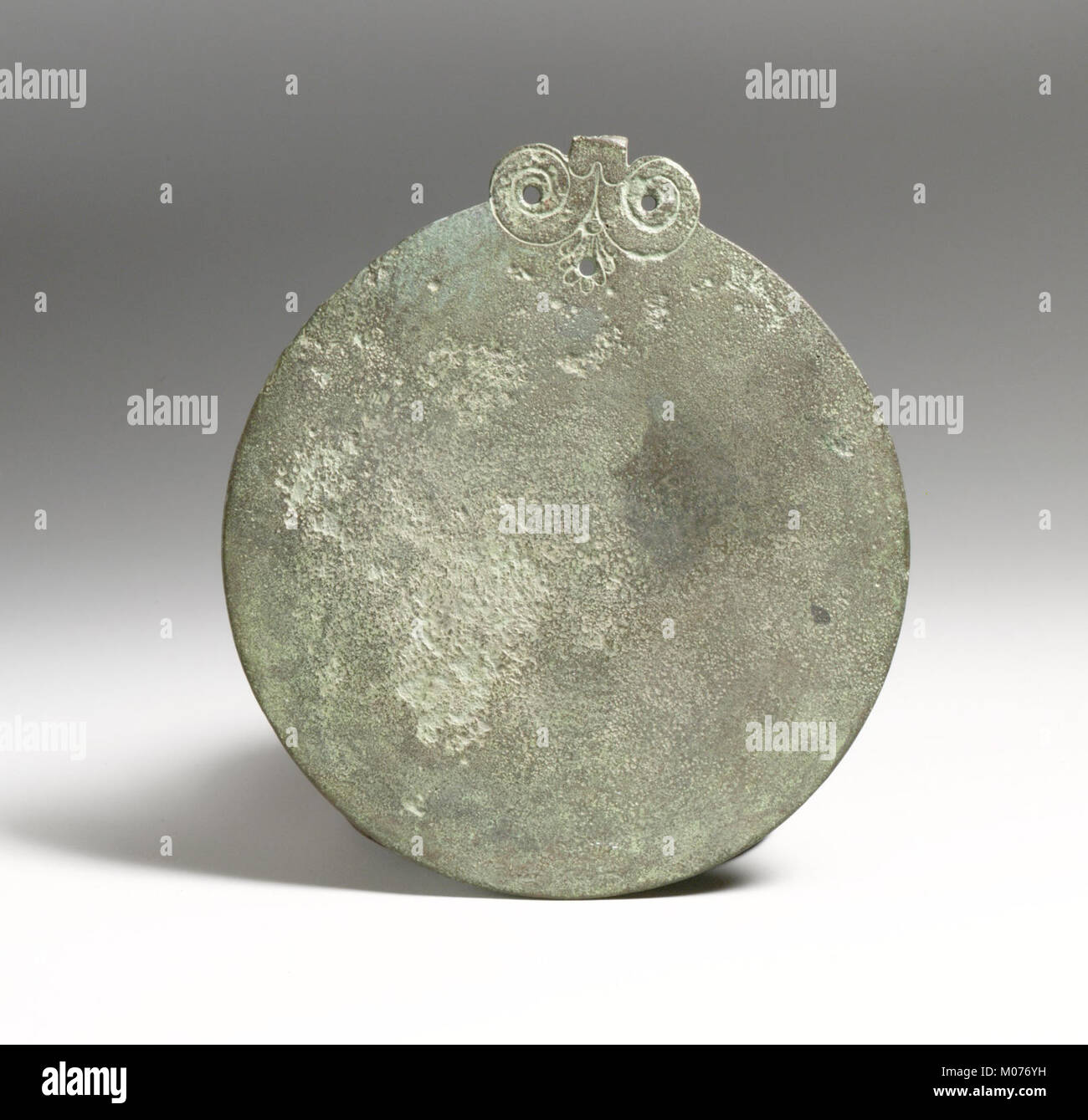 This mirror is a fine example of decorative craftsmanship, showcasing ...