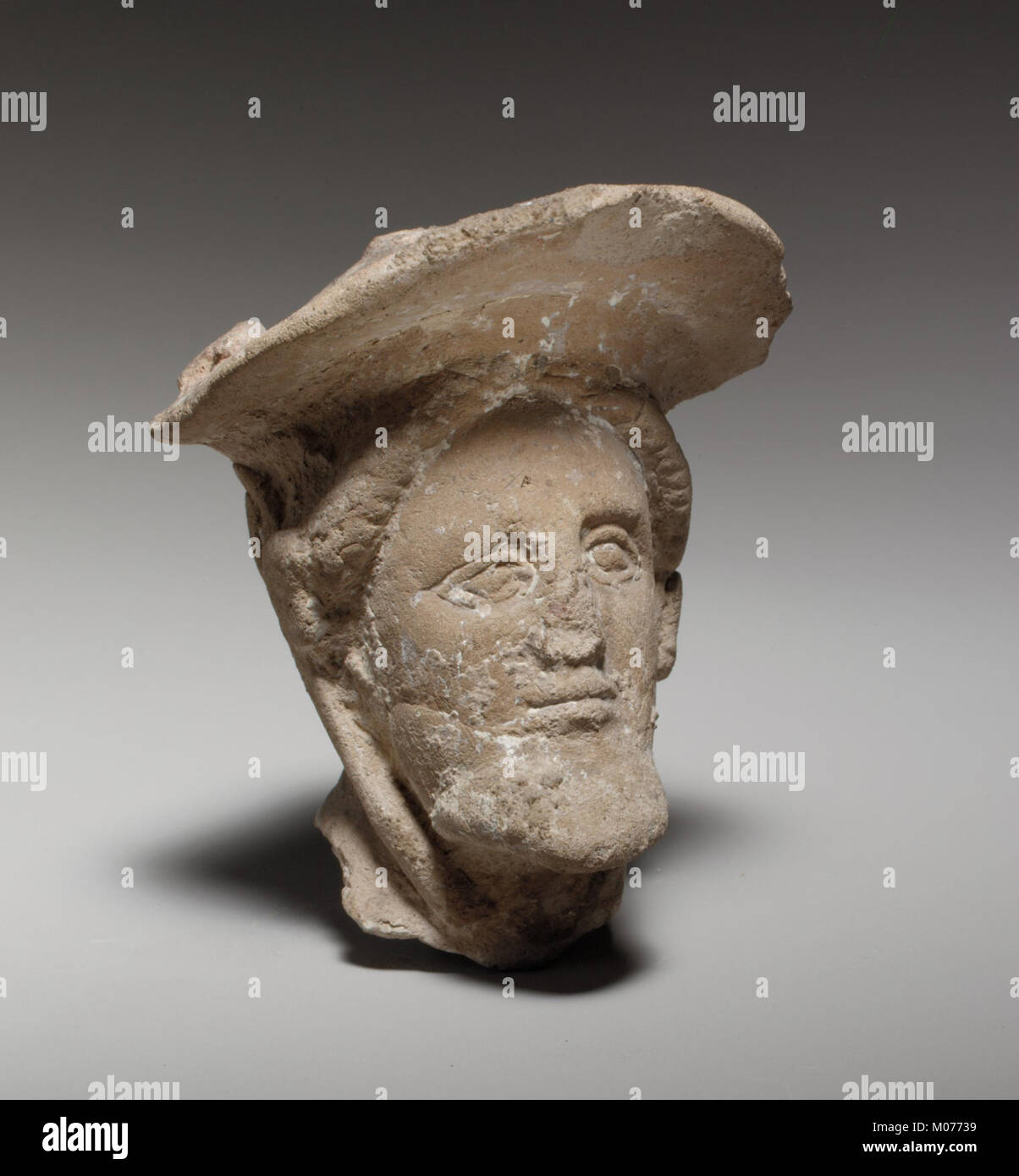 A male head sculpture from The Metropolitan Museum of Art, showcasing ...