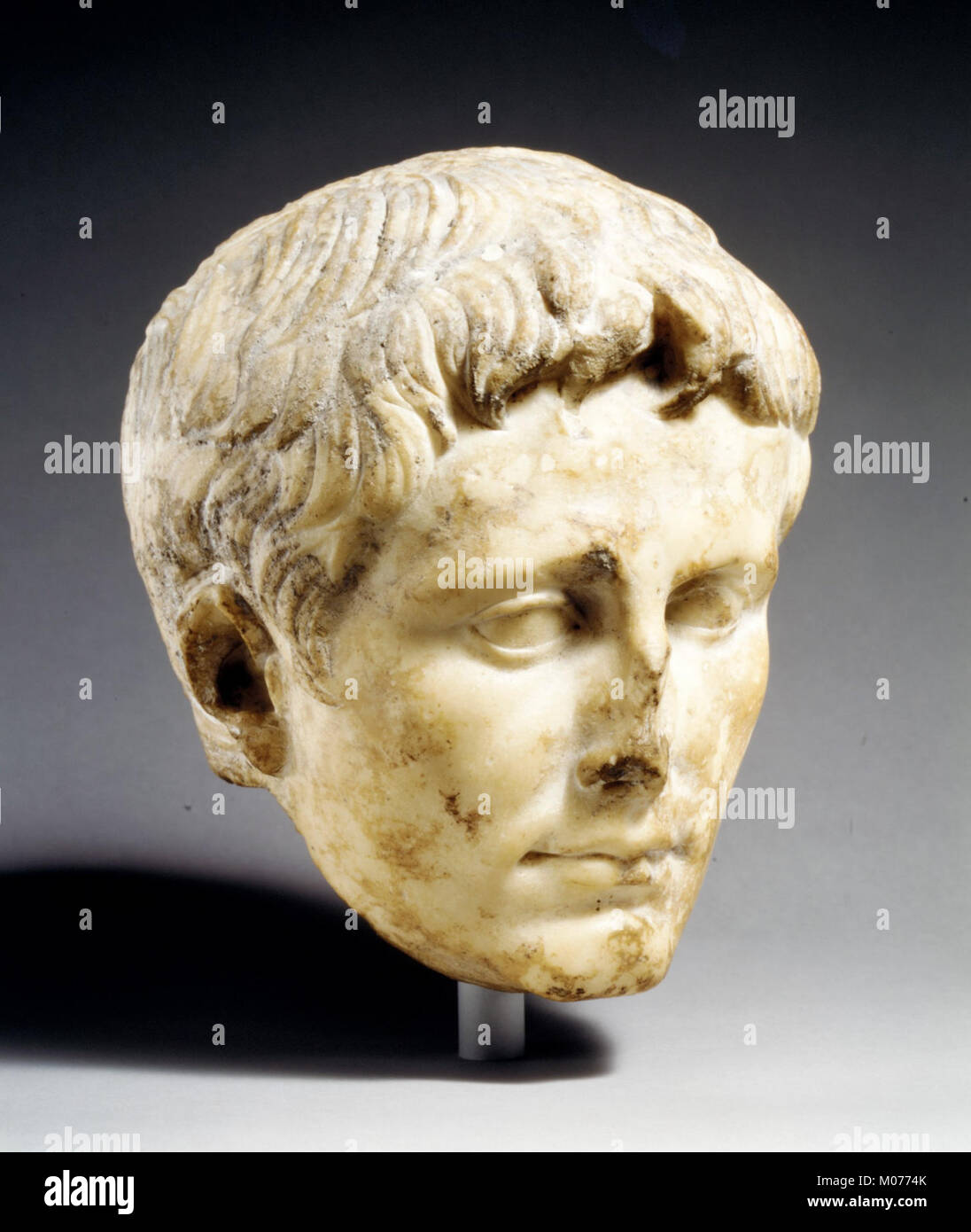 This marble portrait of Emperor Augustus showcases the idealized ...