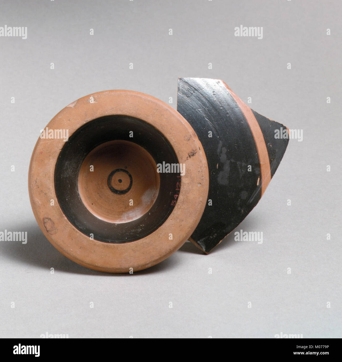 A fragment of a kylix, an ancient Greek drinking vessel, offering ...