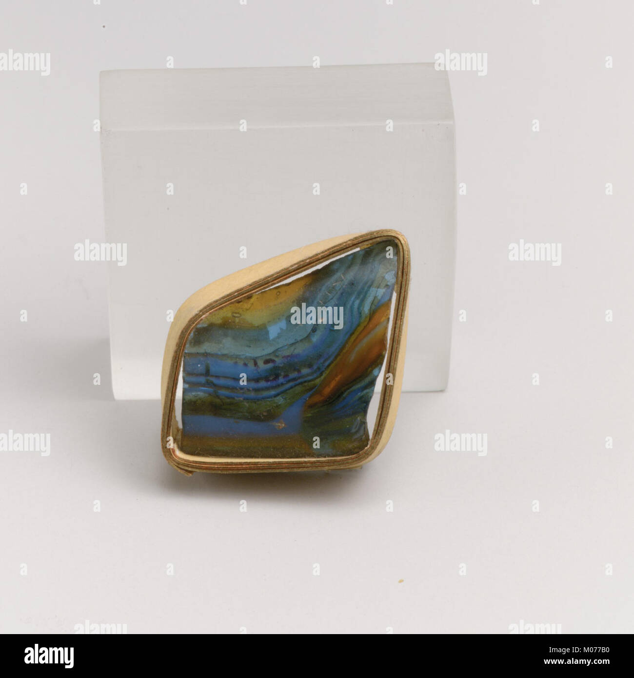 This mosaic glass fragment, part of a larger decorative object ...