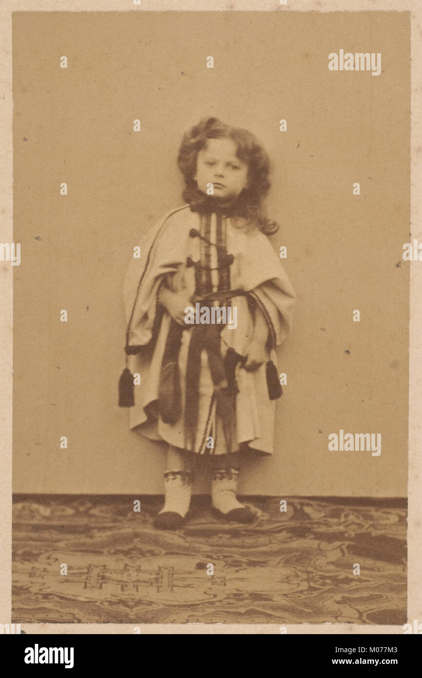 A bournous, a traditional cloak worn in North Africa, typically made ...