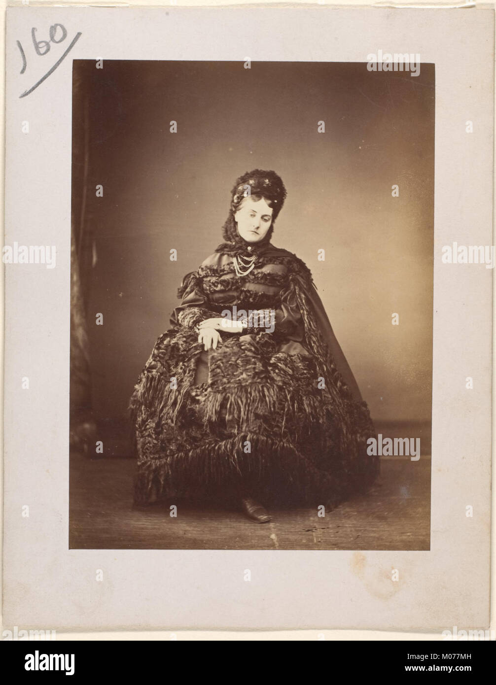 Astrakhan coat hi-res stock photography and images - Alamy