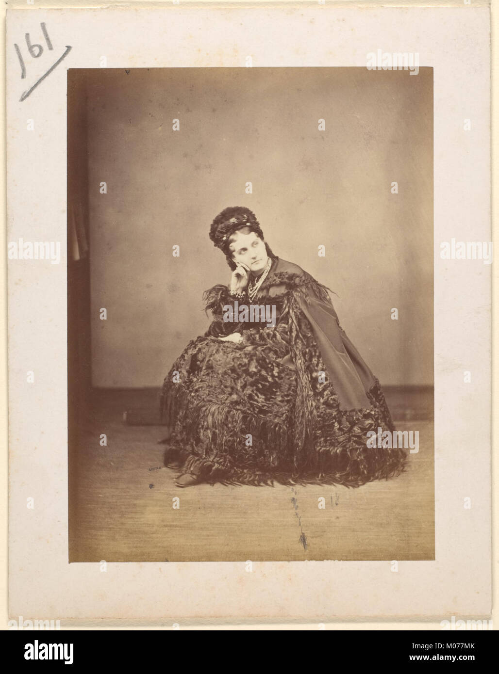 Astrakhan coat hi-res stock photography and images - Alamy