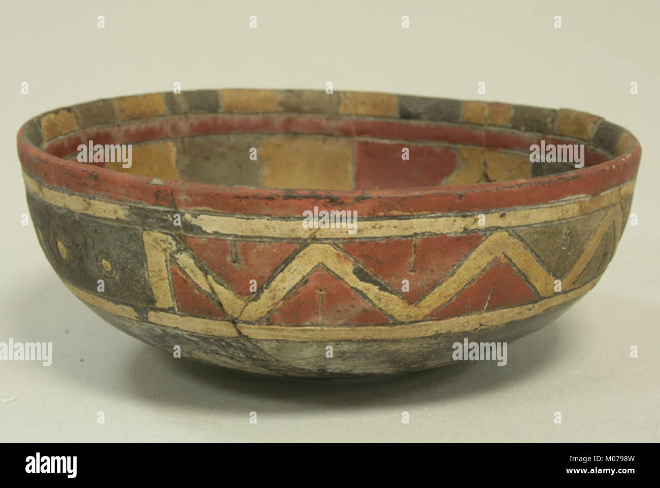 This incised bowl showcases fine craftsmanship, featuring intricate ...
