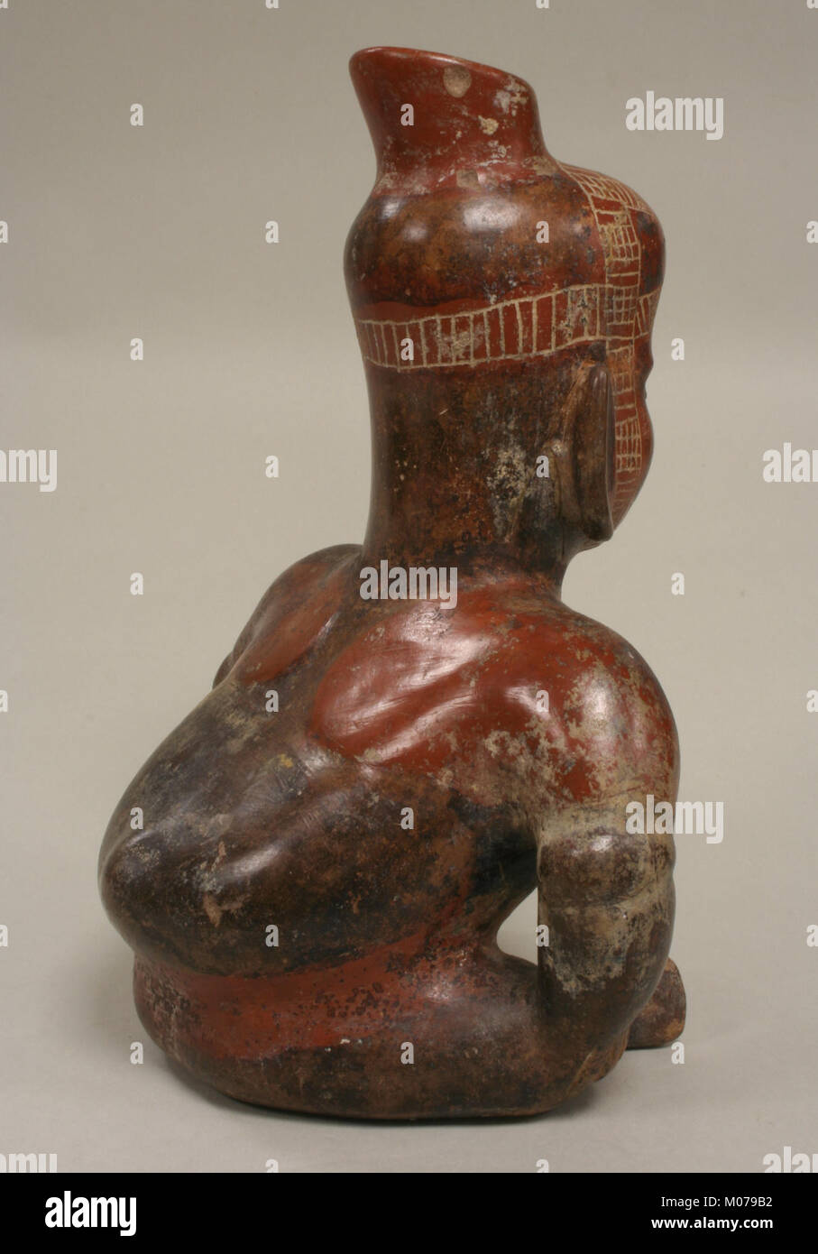 This vessel depicts a hunchback figure, showcasing the artistry and ...