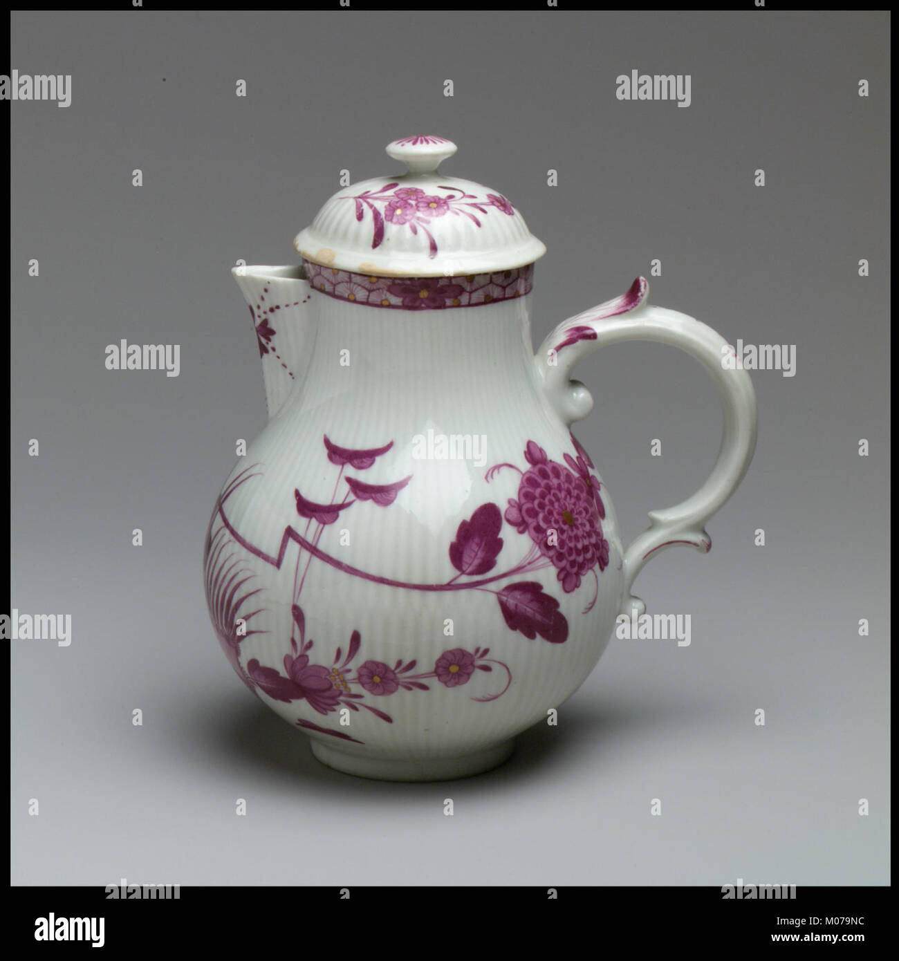 This milk jug, accompanied by a cover, is a fine example of 19th ...