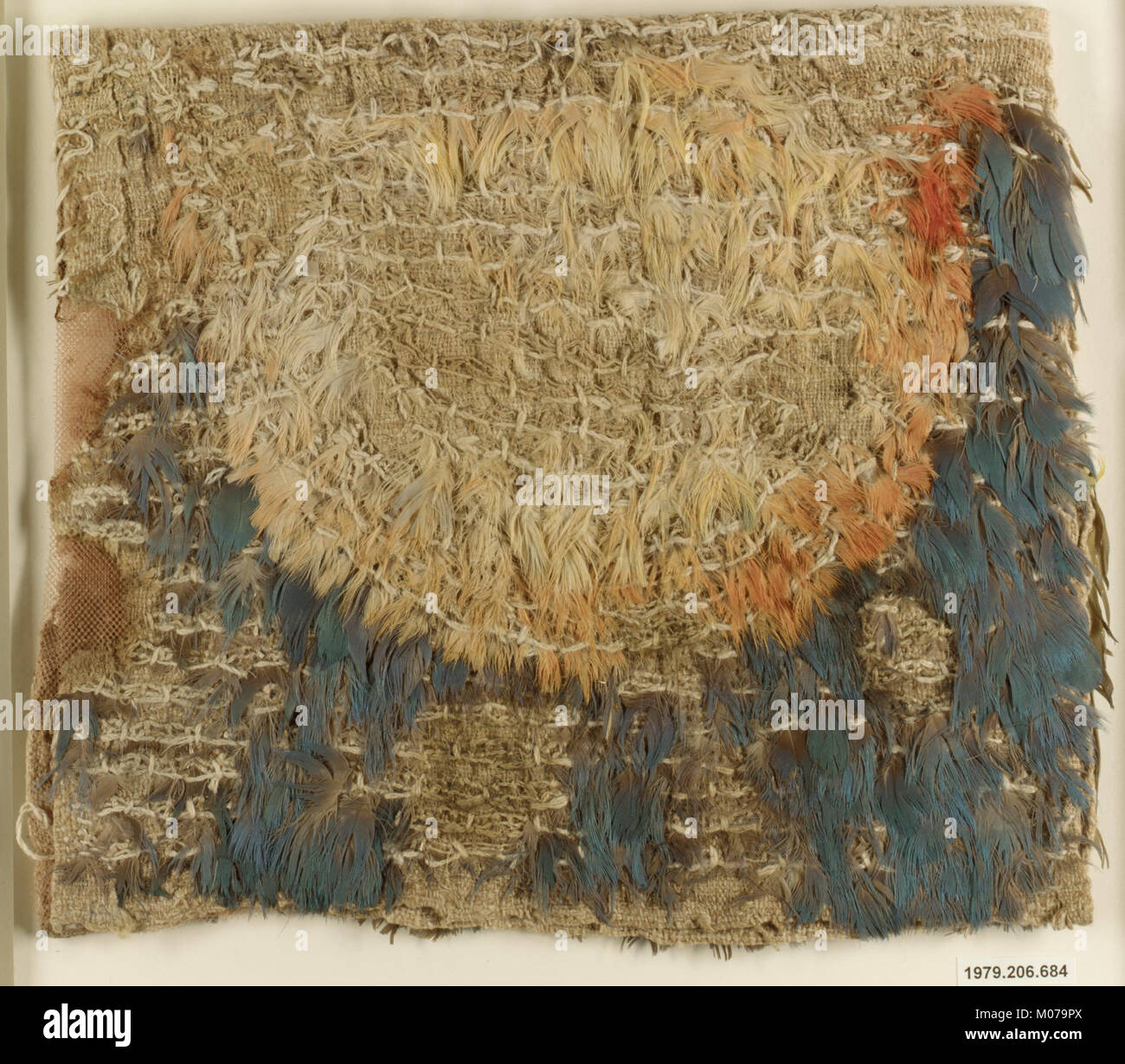 This miniature tunic is a detailed representation of traditional ...