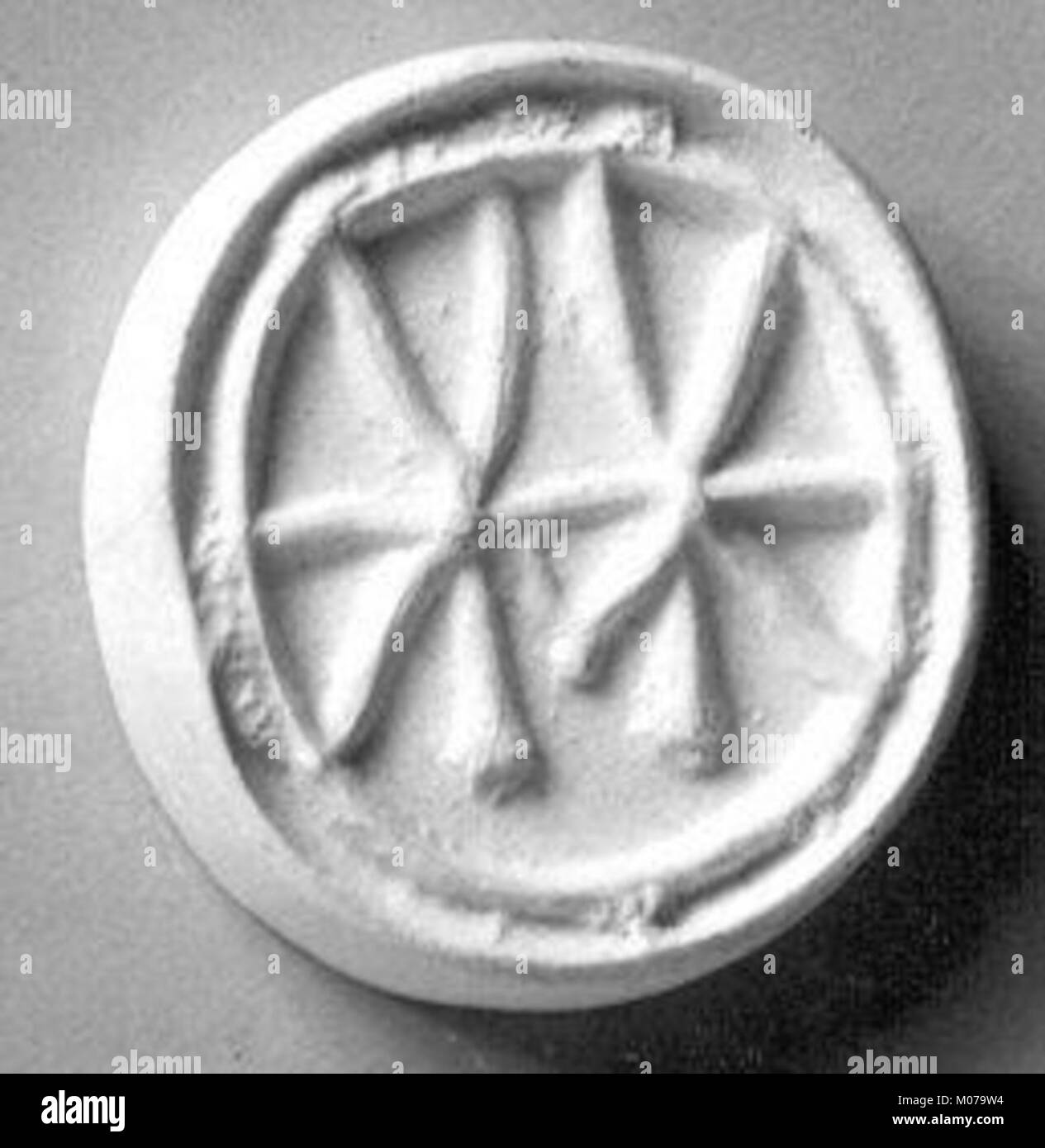 A loop-handled conoid seal from ancient civilizations, used for ...