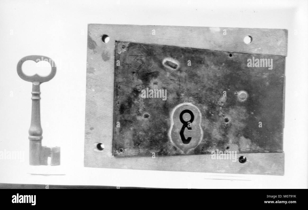 A lock and key, crafted from metal or other materials, reflecting the ...