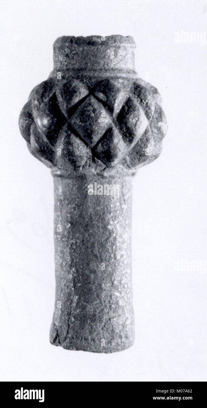 This mace head is a significant artifact from ancient times, showcasing ...
