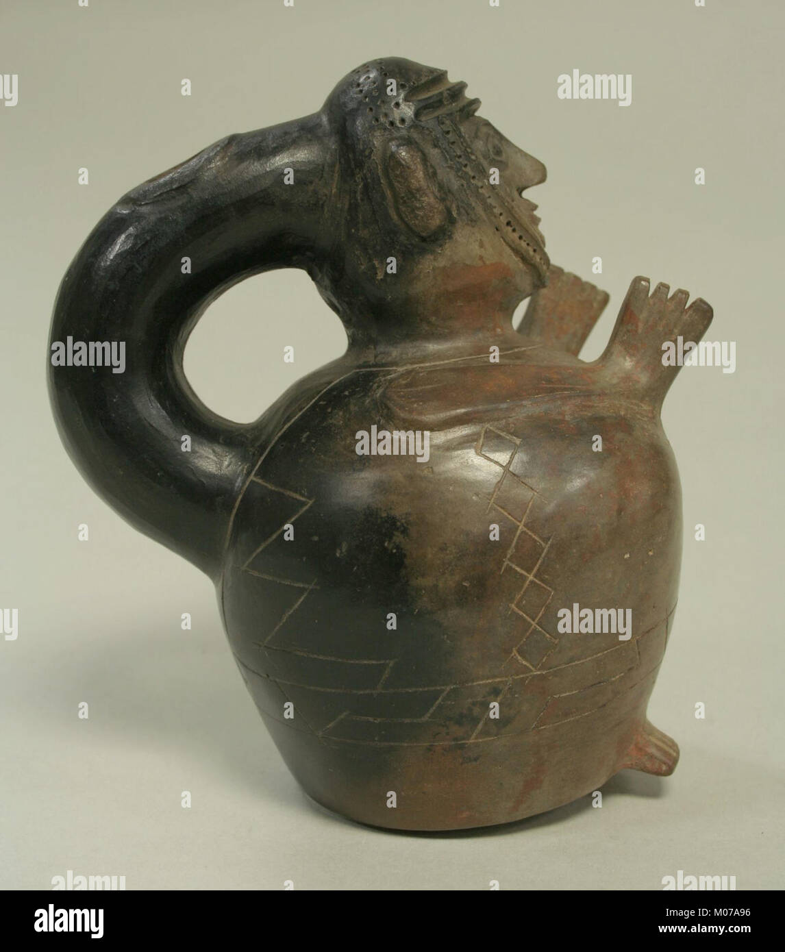 This effigy vessel depicts a male figure and is a significant example ...