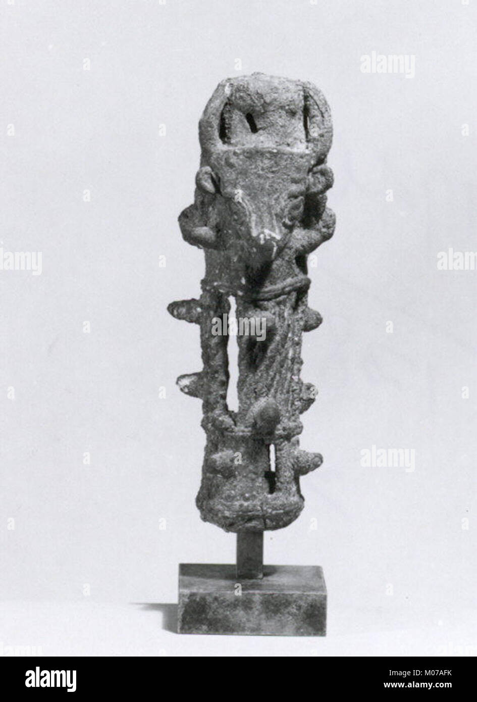 These mace heads are shaped like triple bulls' heads, showcasing the ...