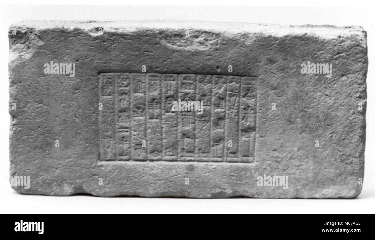 An inscribed brick from ancient architecture, likely used in ...