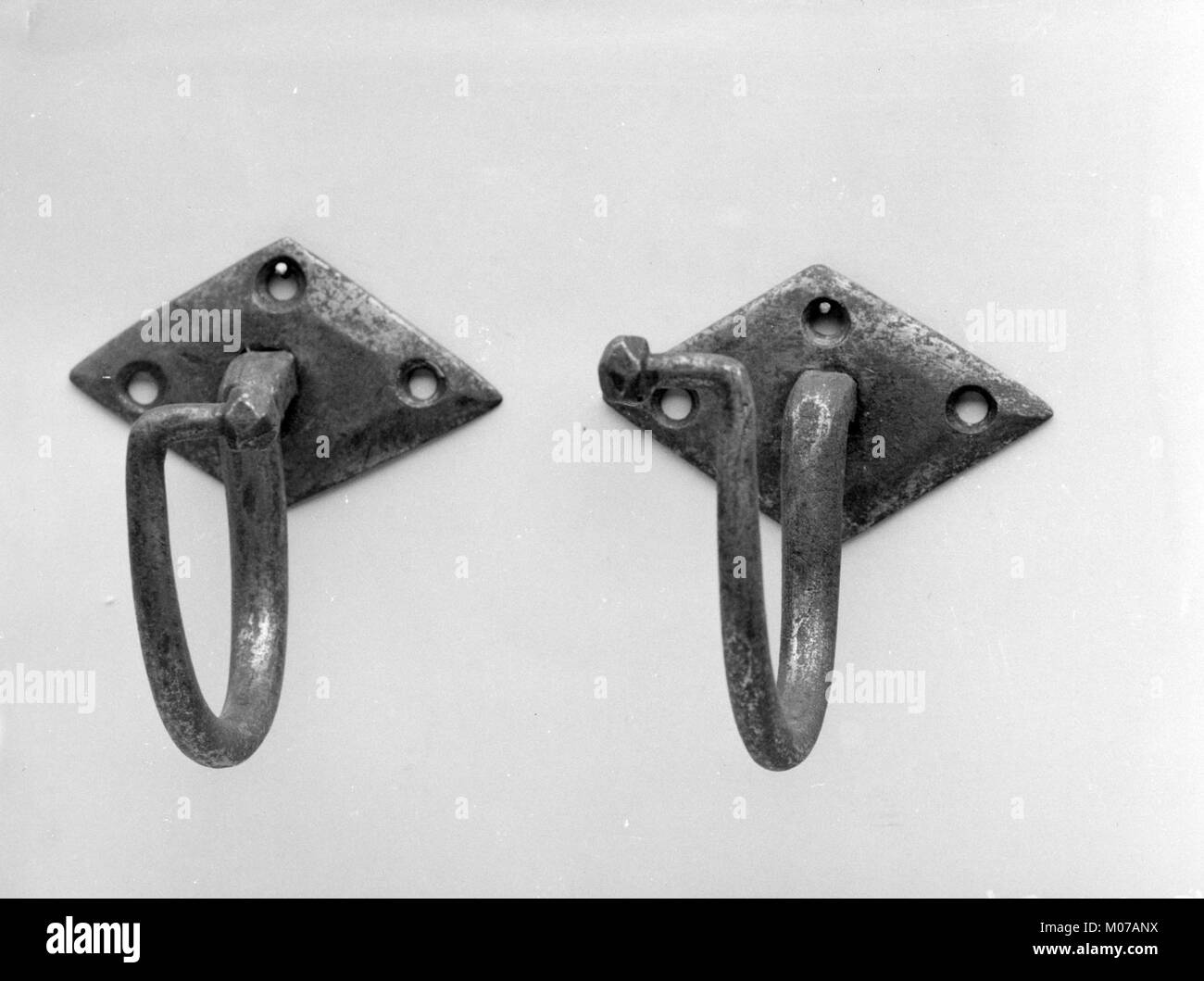 This jamb hook is a functional decorative element used in architecture ...