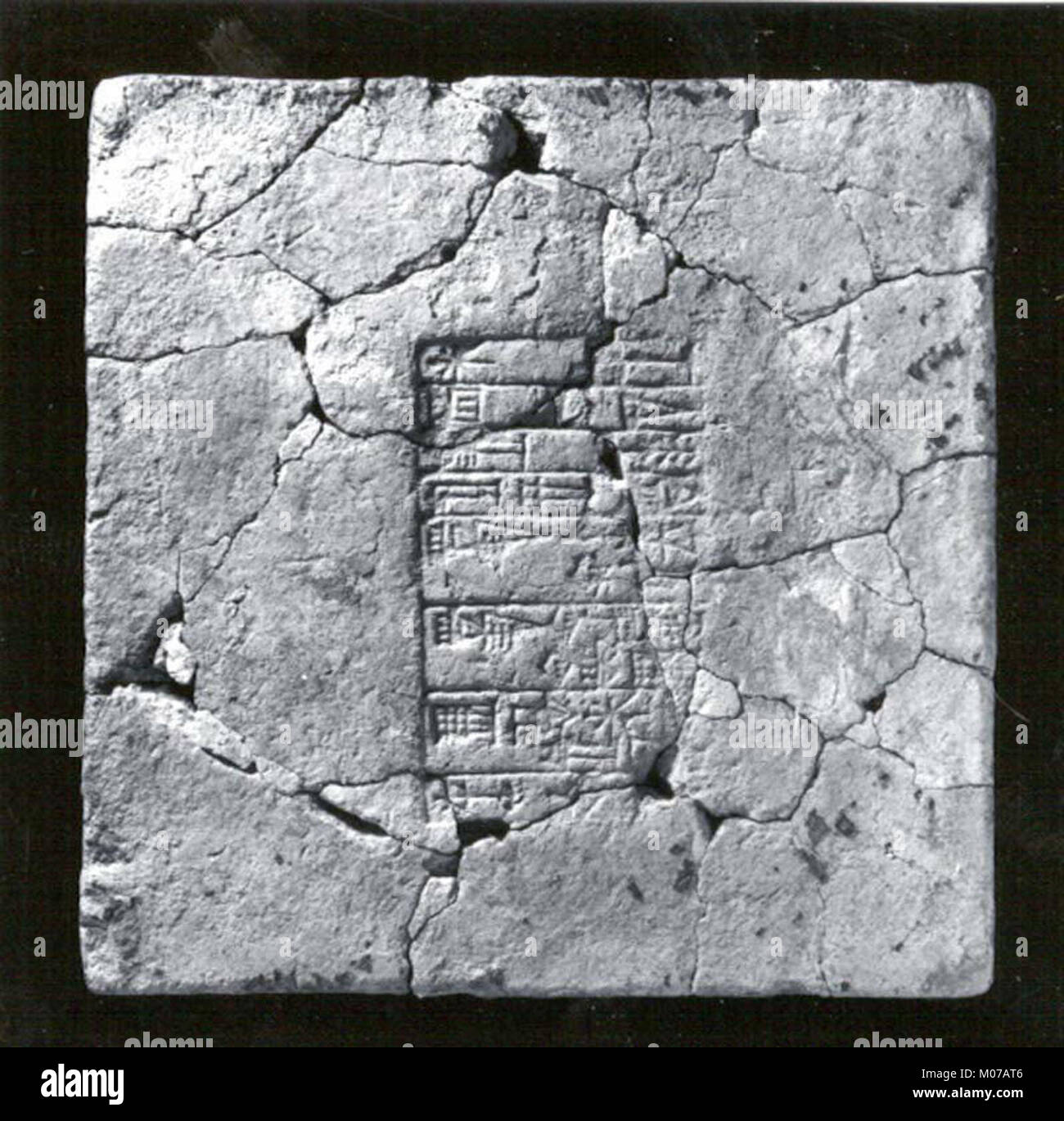 This inscribed brick dates back to the ancient period and features ...