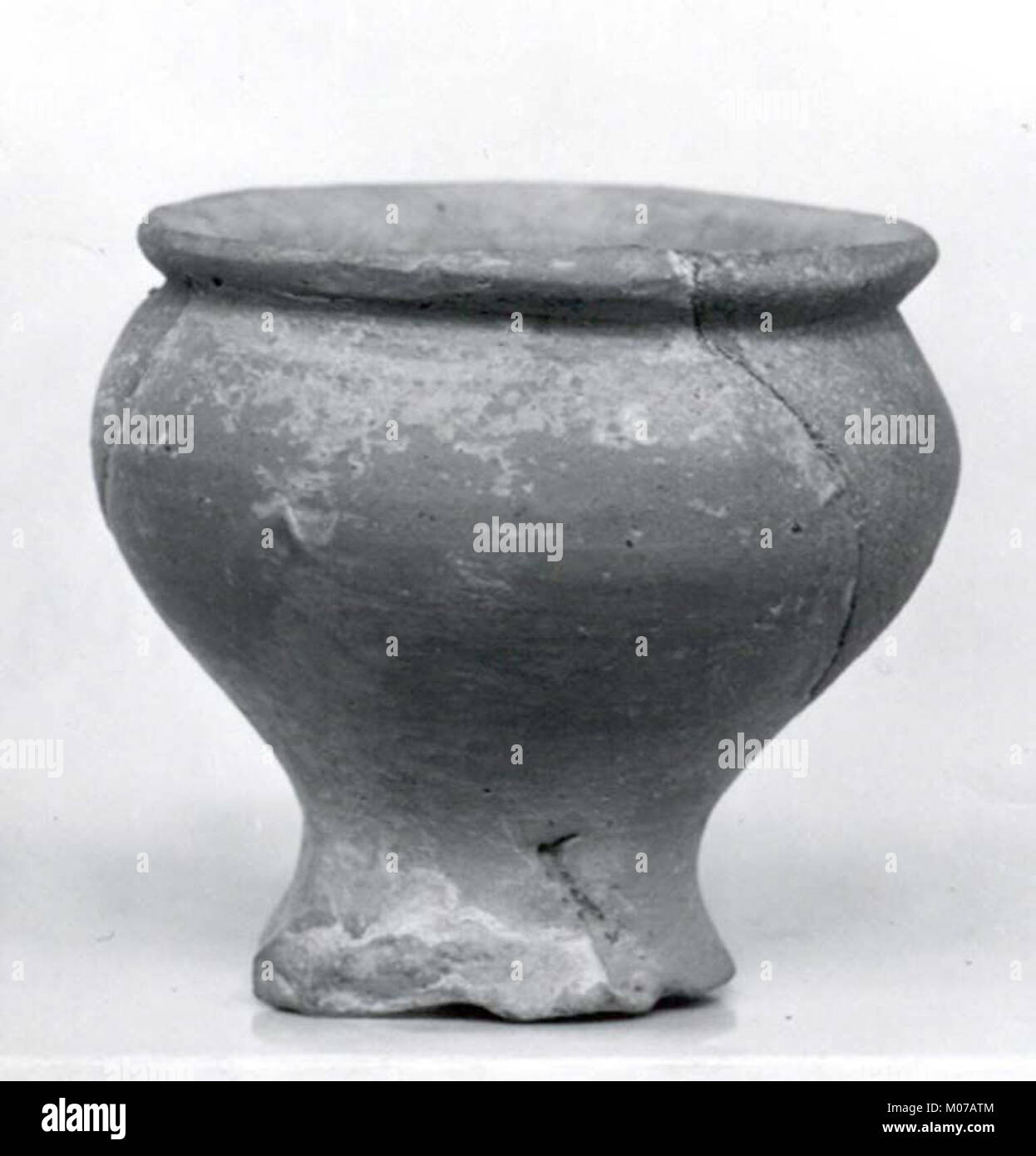 This jar, likely of ancient origin, serves as an important example of ...