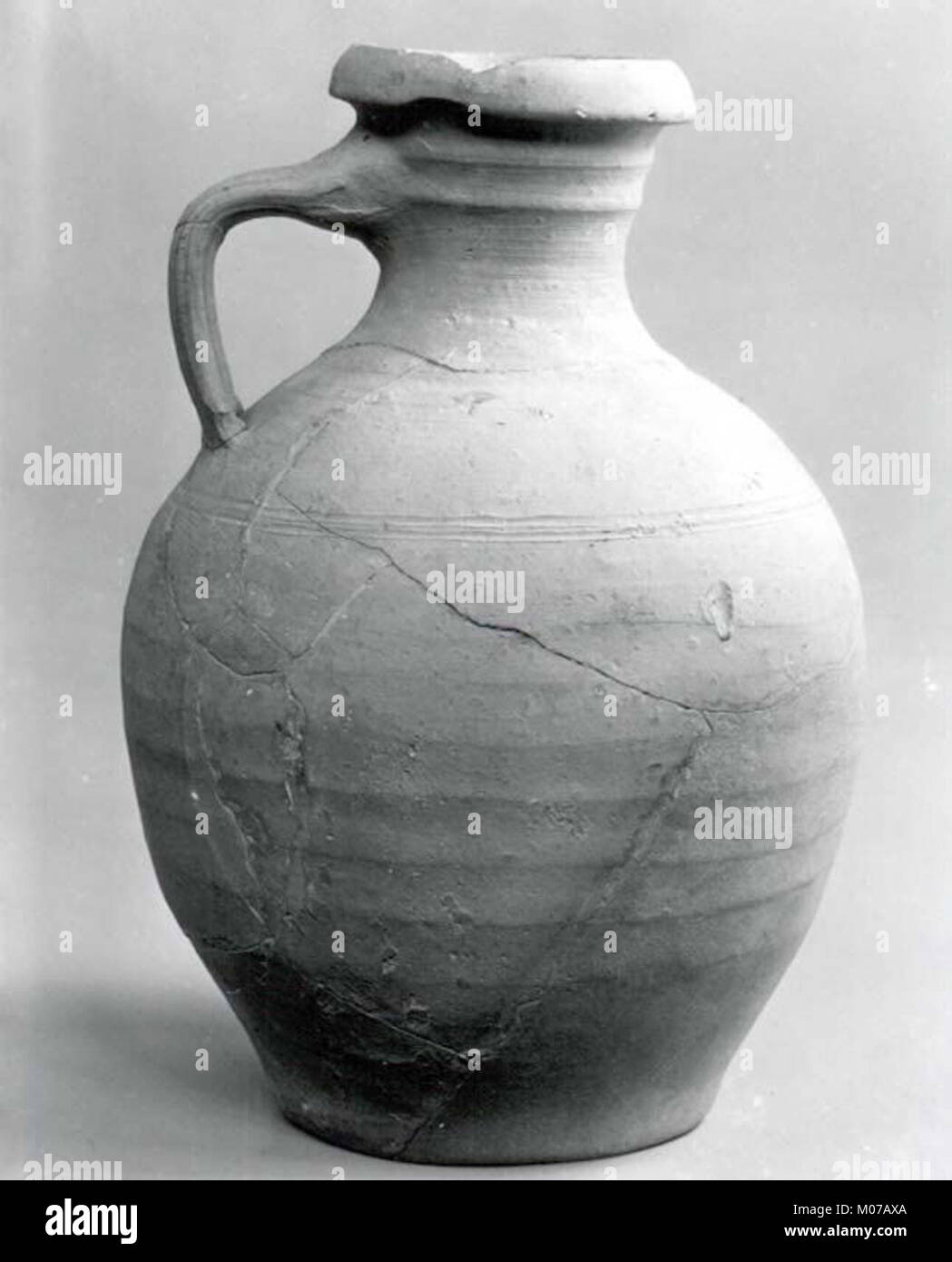 This jug features a classic design with a handle, common in European ...