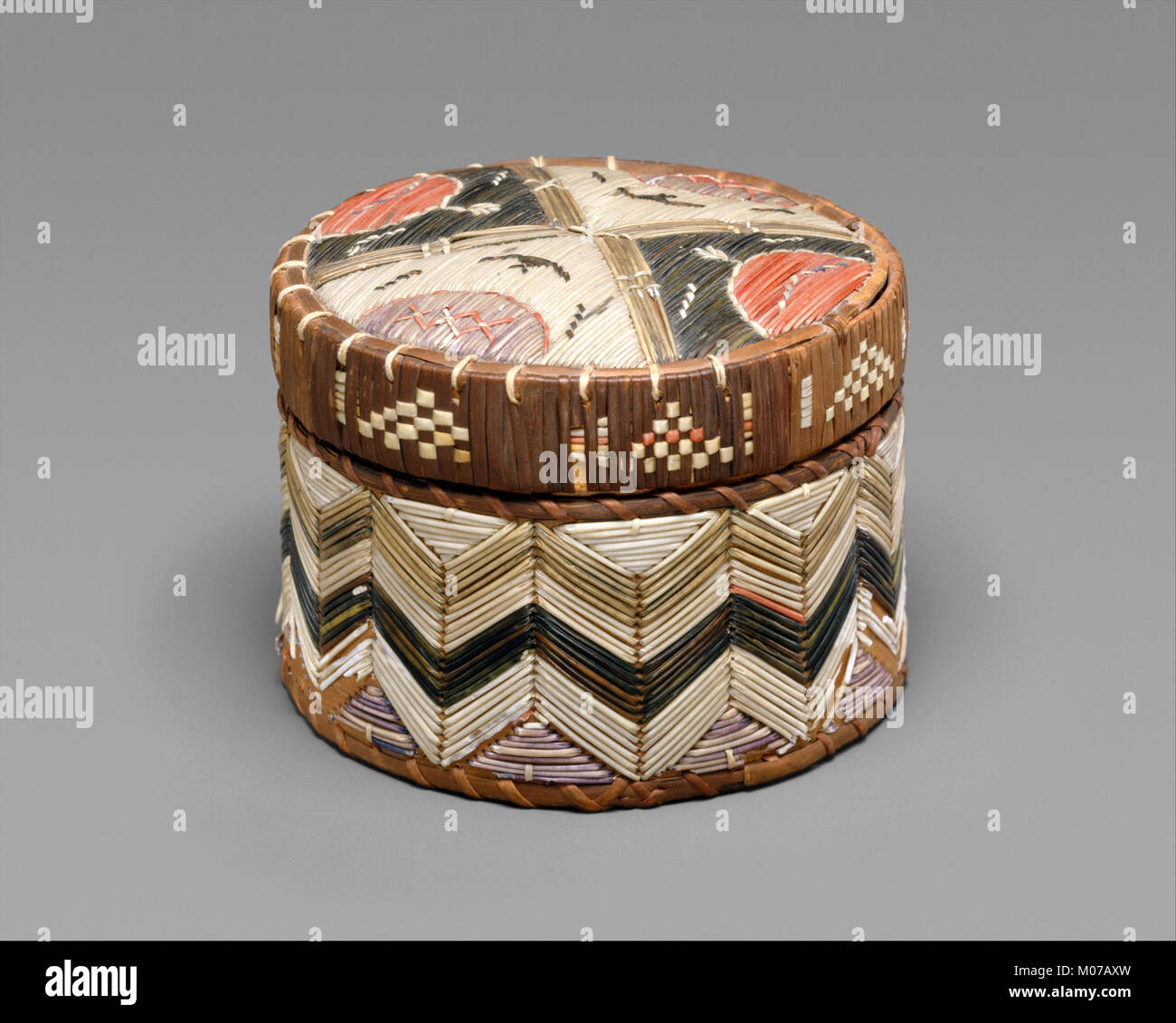 This lidded box, crafted from metal, showcases the detailed ...