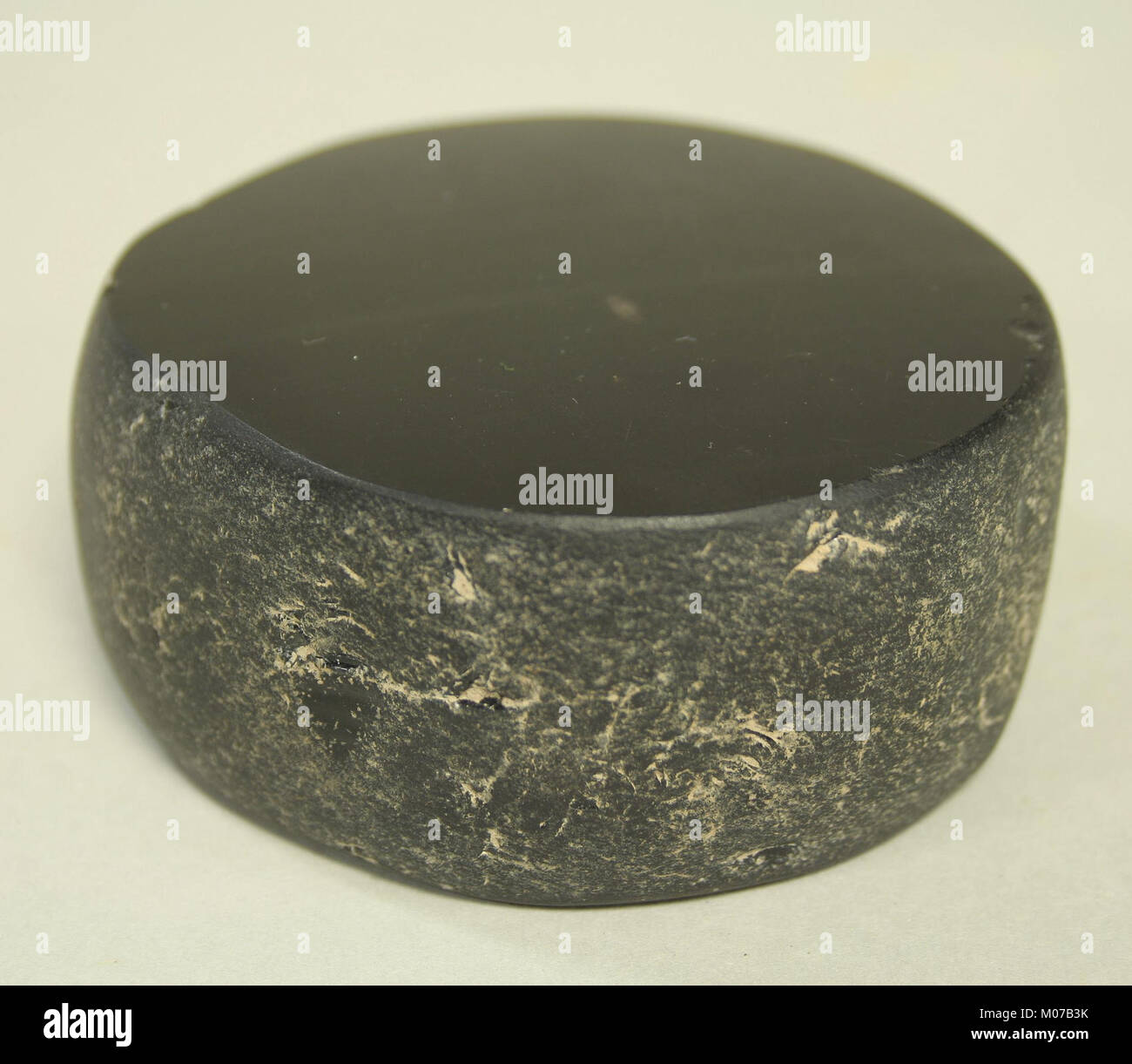 This obsidian mirror is an example of ancient craftsmanship, made from ...