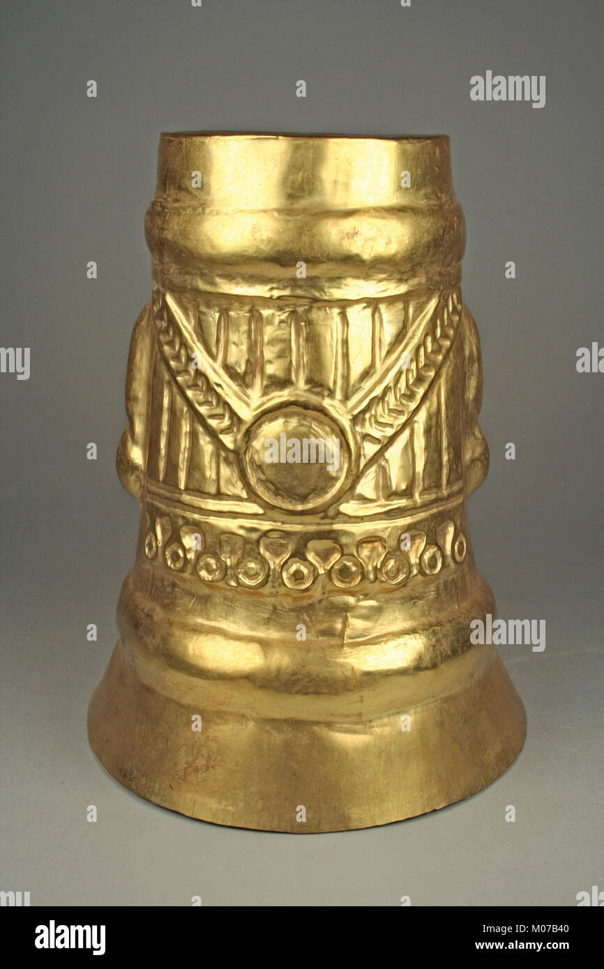 This beaker with an inverse-face design demonstrates reverse-carved ...