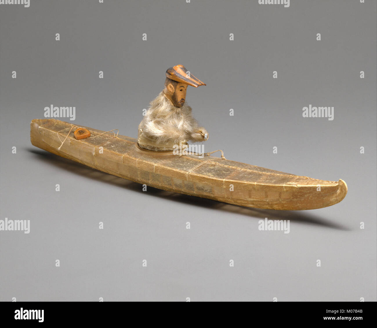 This kayak model with hunter figure shows indigenous traditional boat ...
