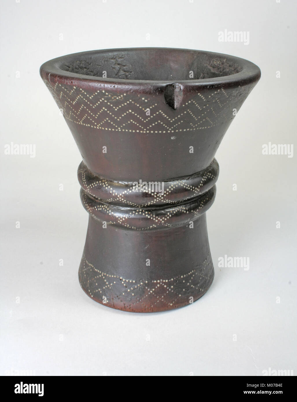 This Kero, a ceremonial drinking vessel, originates from the Andean ...