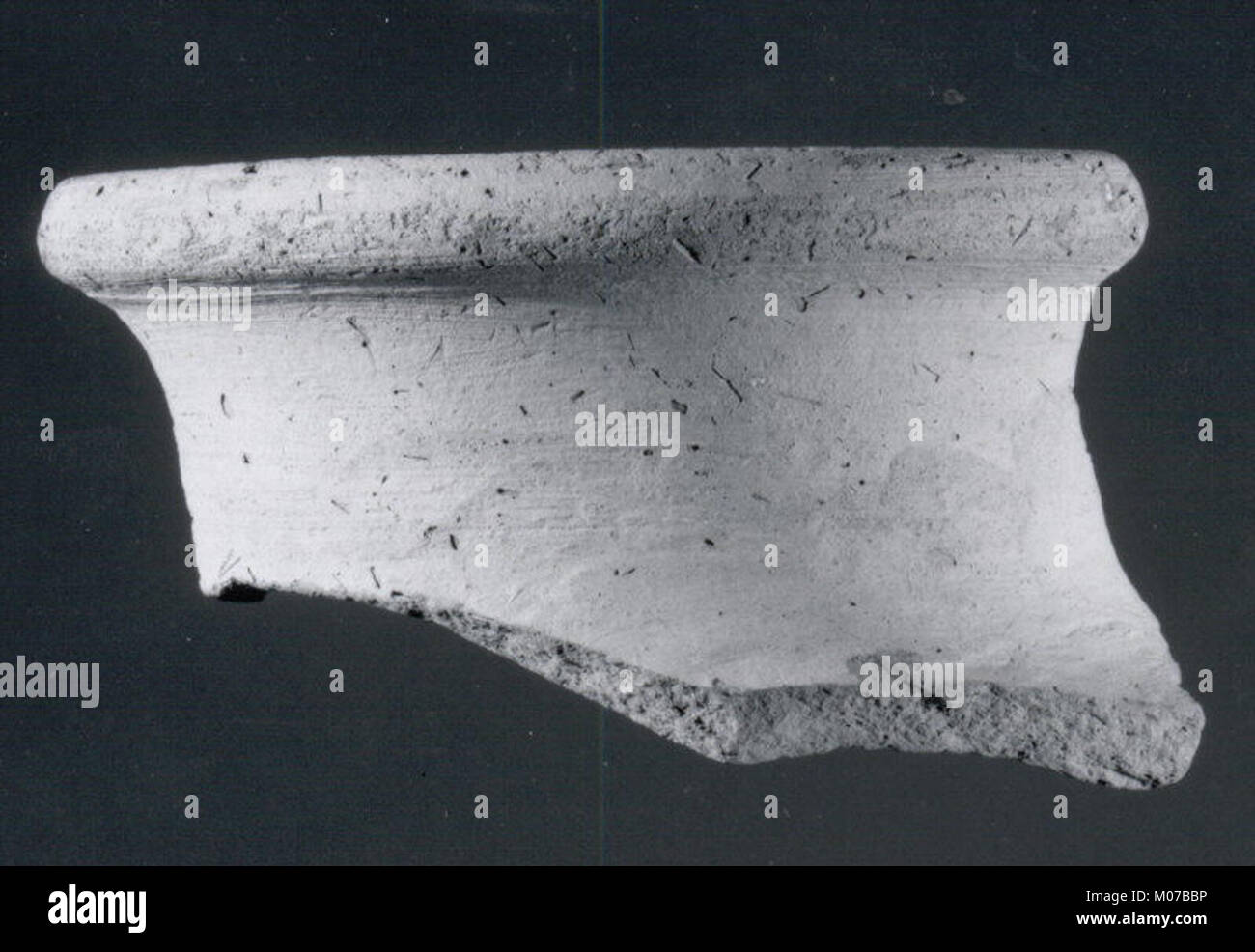 This jar rim sherd is a fragment of a larger pottery vessel. It reveals ...