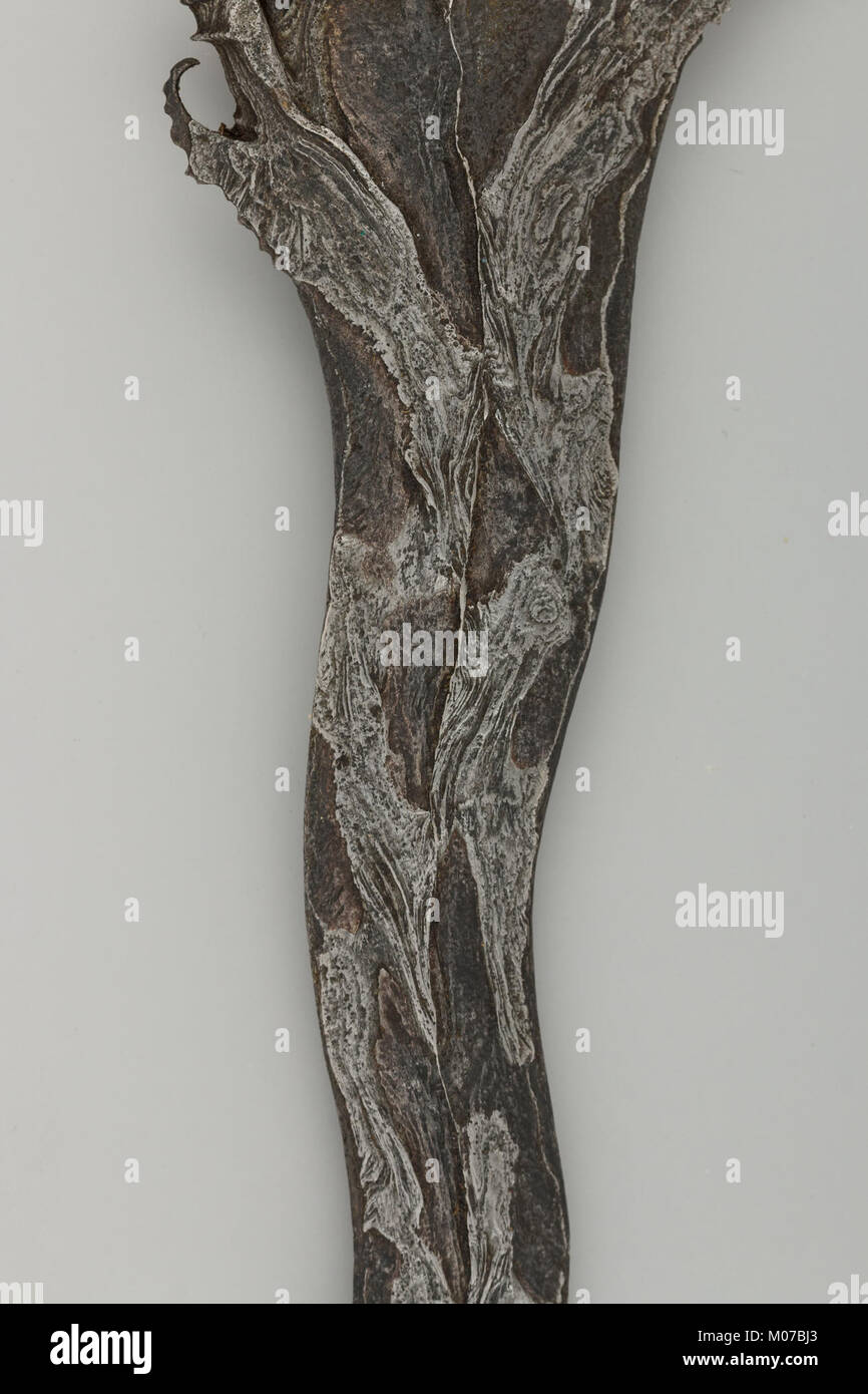 This Kris with sheath is an intricately crafted weapon from Southeast ...