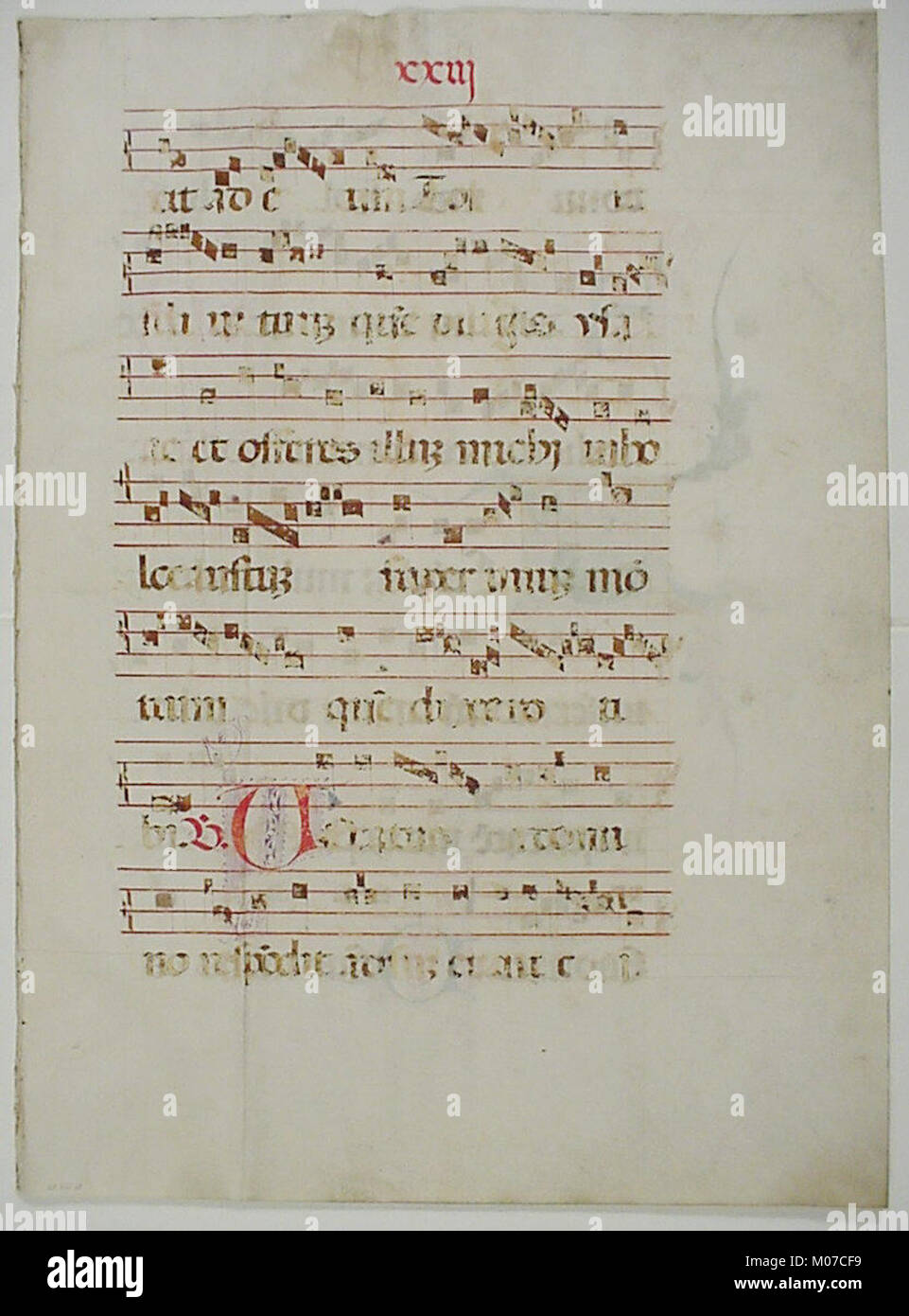 This manuscript leaf features an ornate initial 'S' from an antiphonary ...