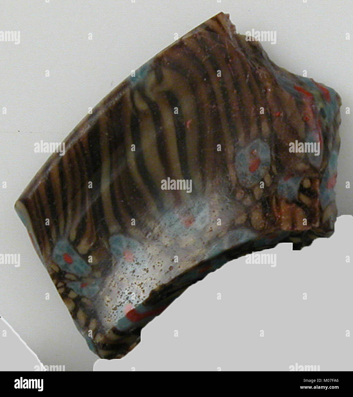These mosaic glass fragments, part of a larger vessel, date back to the ...