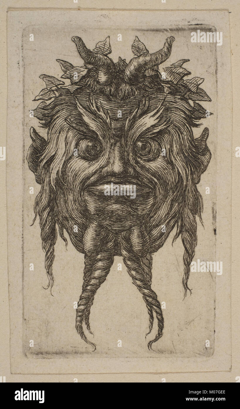 This mask is an example of ancient ceremonial art, used in rituals or ...