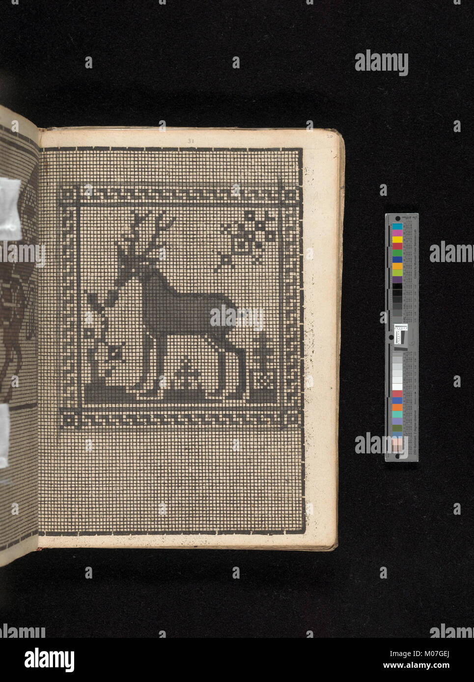This manuscript album contains lace and embroidery designs ...
