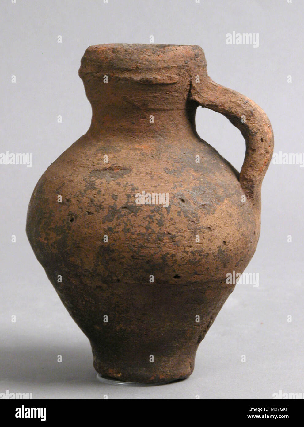A jug, showcasing the material and design characteristics of its period ...