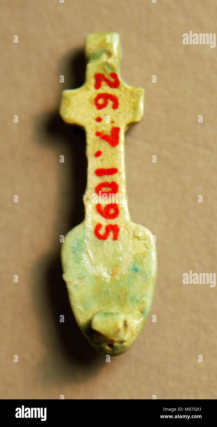This Nefer amulet, dated to ancient Egypt, represents the symbol of ...