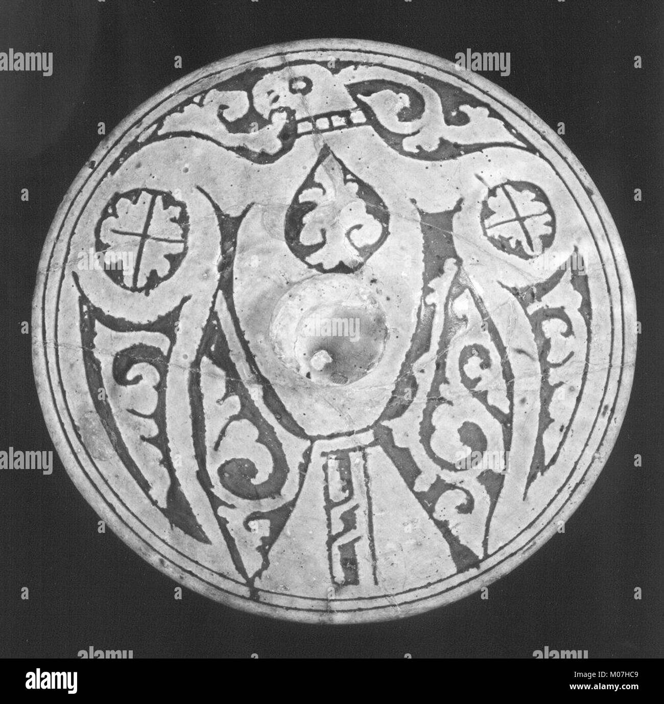 This lid, part of the MET collection, is a well-preserved artifact ...