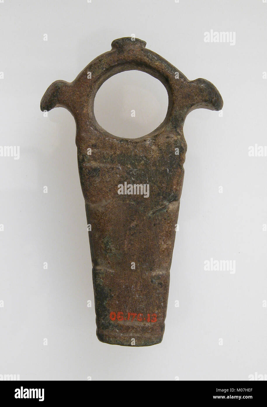 A key handle, part of a larger object, crafted for functional use in ...