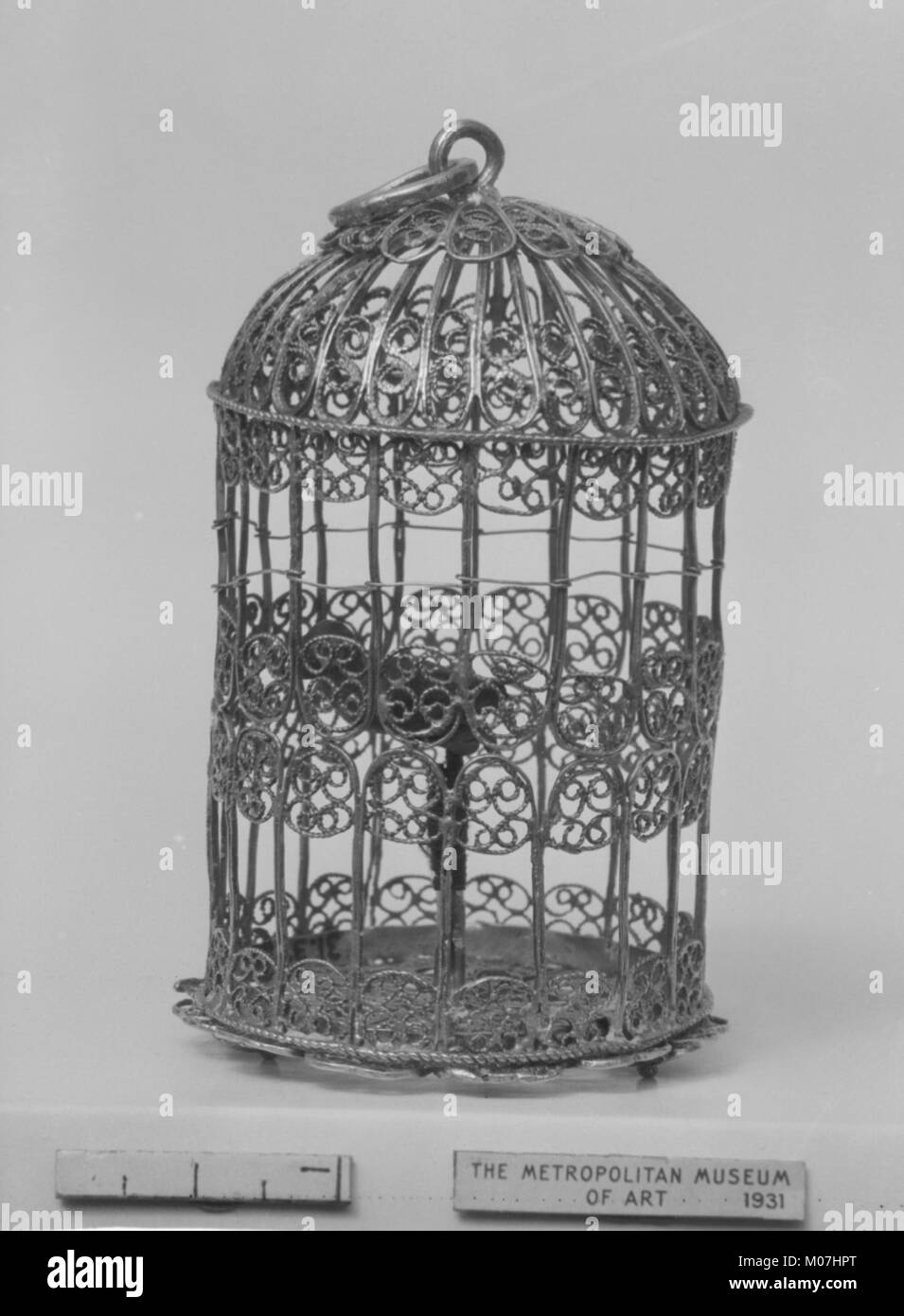 A miniature bird cage exemplifying delicate small-scale decorative art ...