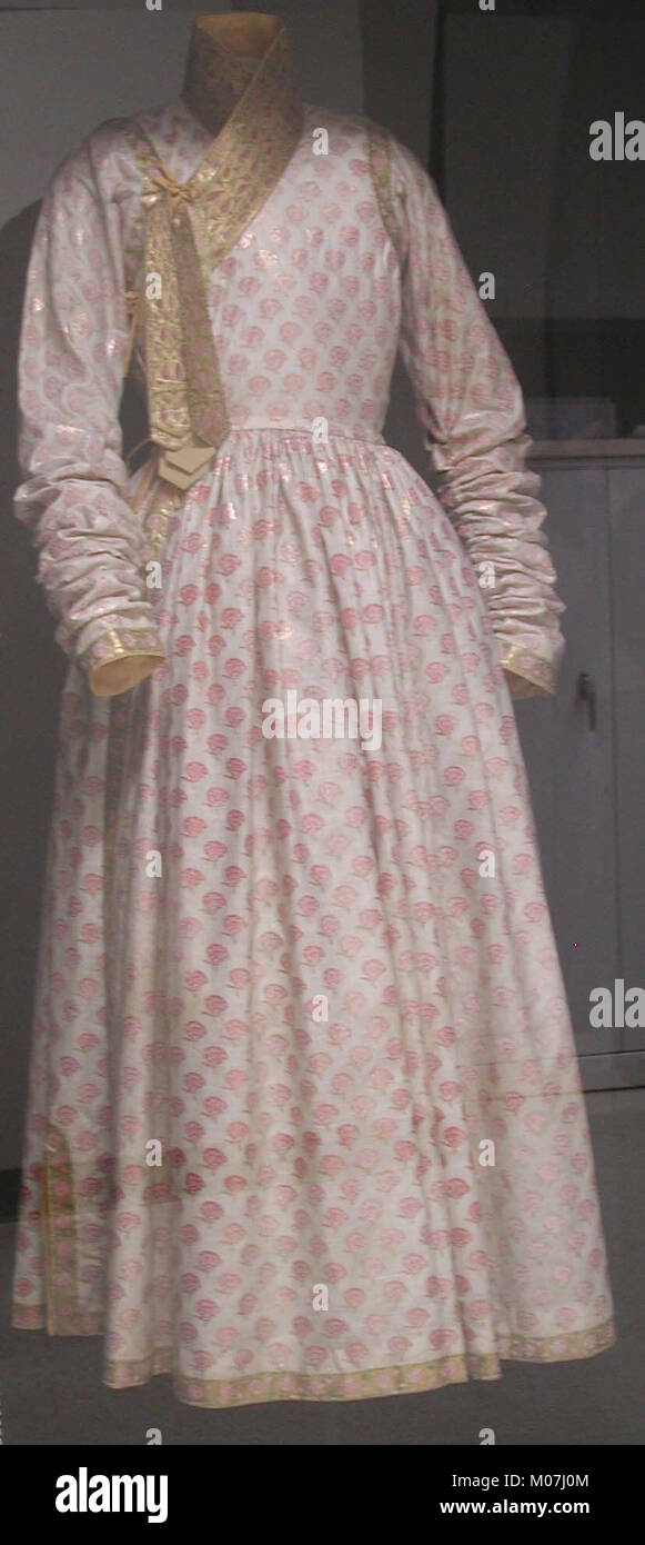 This man's robe (jama) features a vibrant design of poppies, showcasing ...