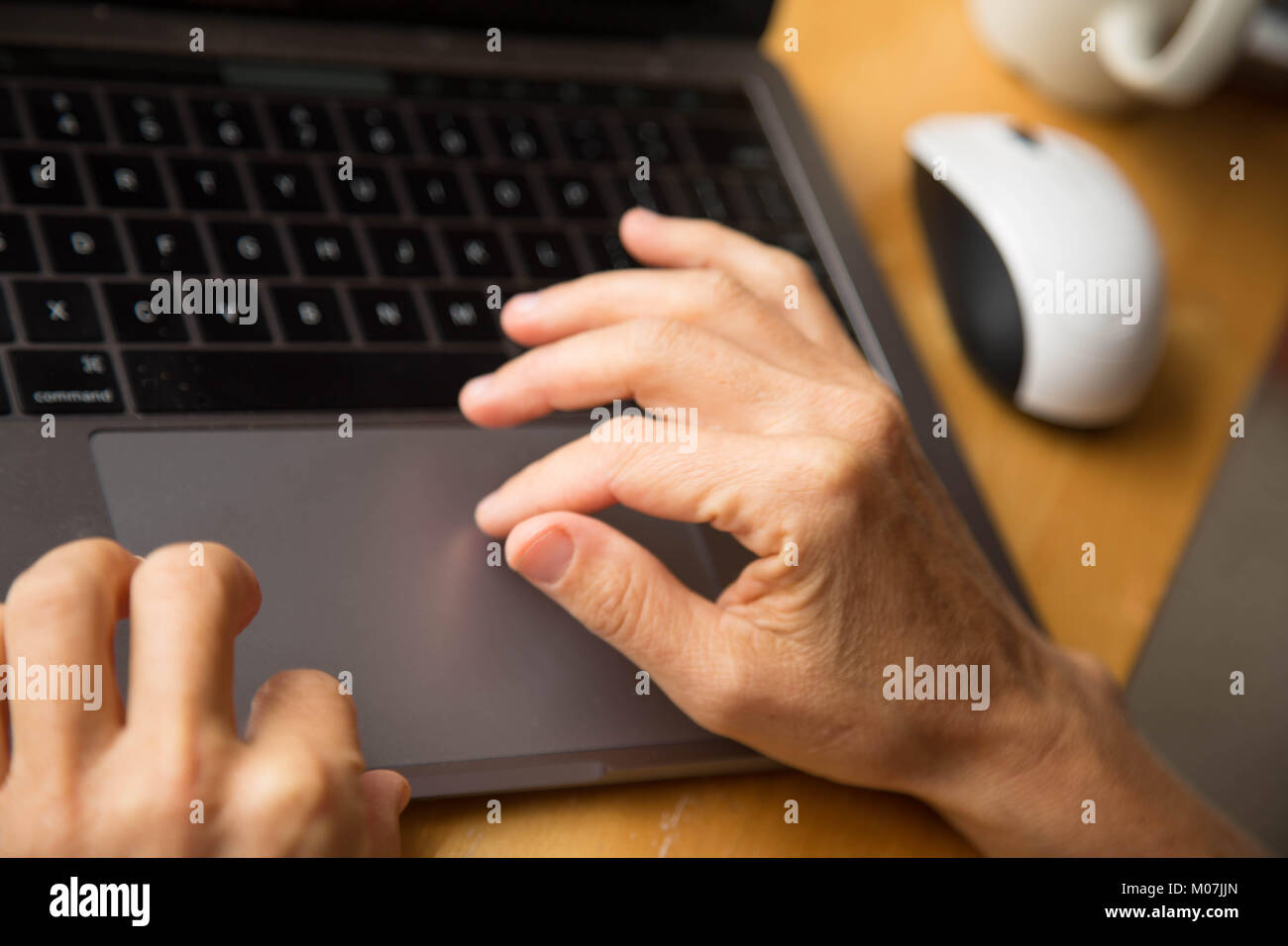 Top shot woman hands typing laptop keyboard Stock Photo - Alamy