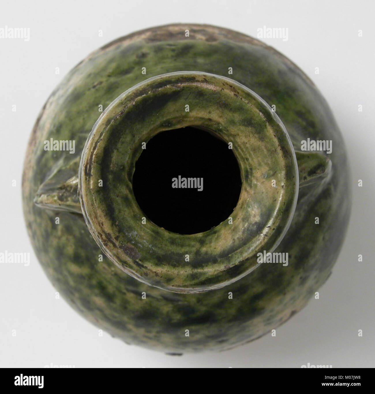 This jug, with distinct design elements, showcases both aesthetic and ...