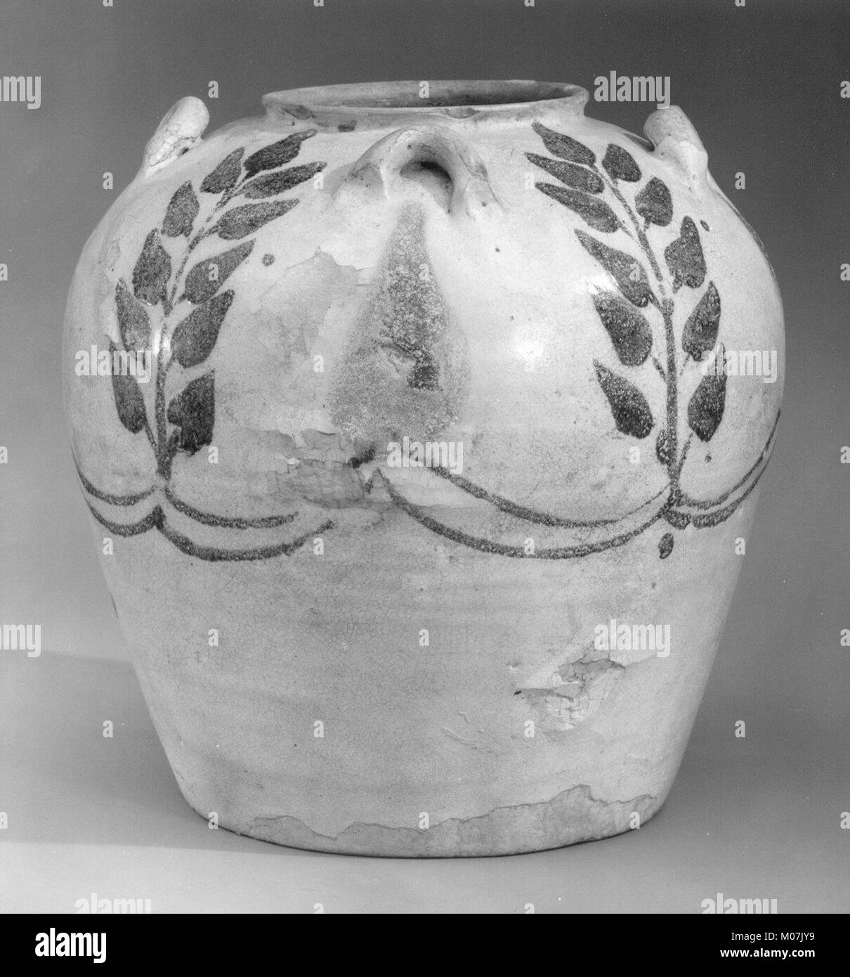 This ancient jar with four lug handles demonstrates functional design ...