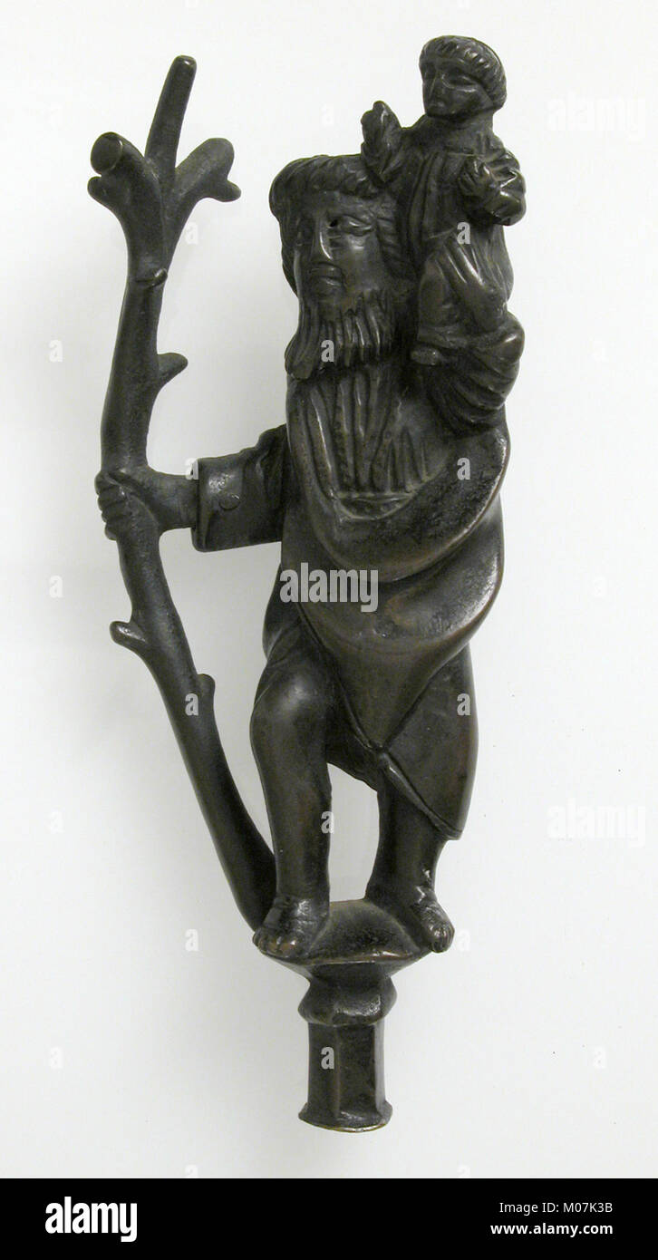 This mount depicts St. Christopher carrying the Christ Child, a ...