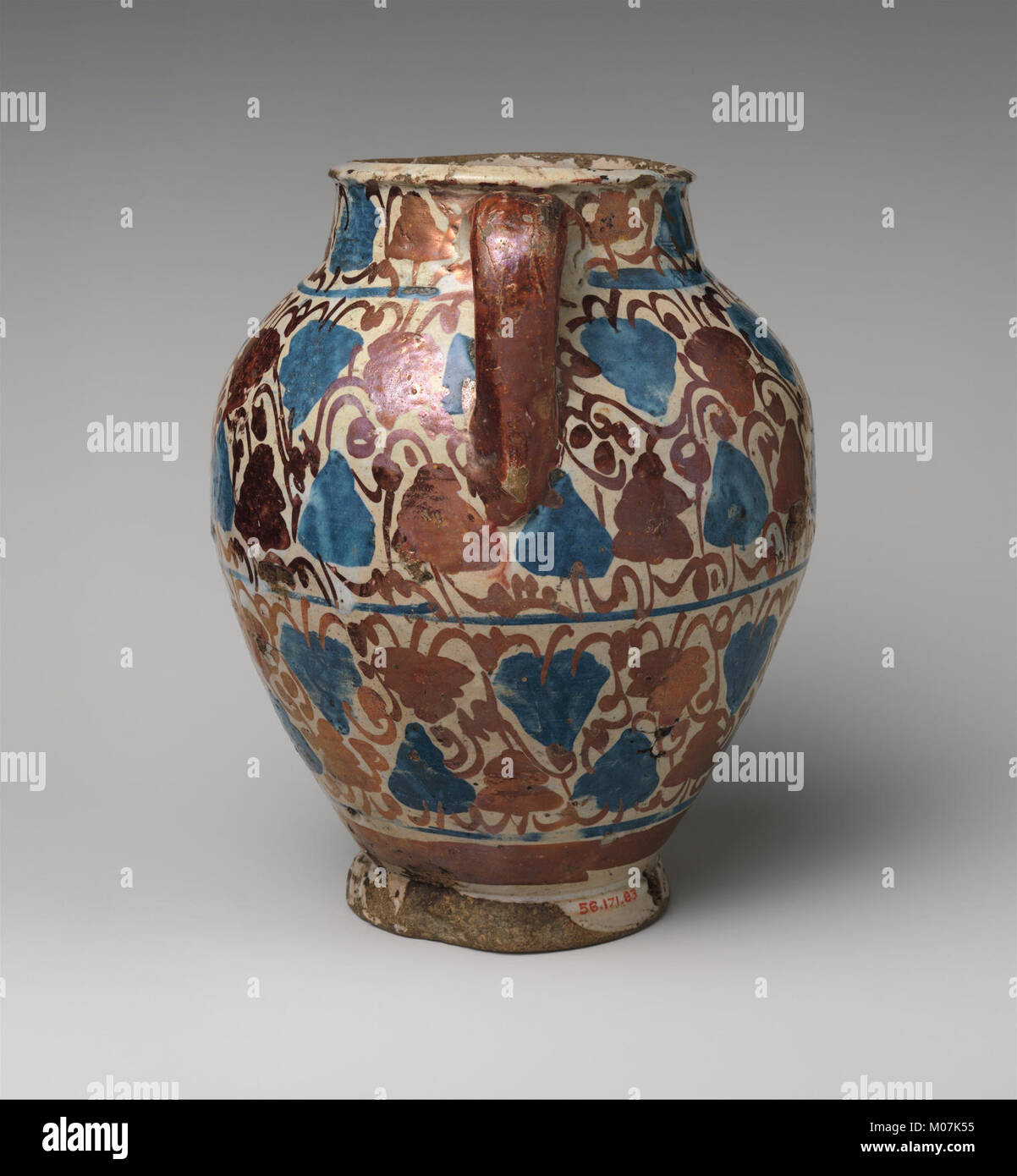 This jug is an example of ancient ceramic ware, designed for functional ...